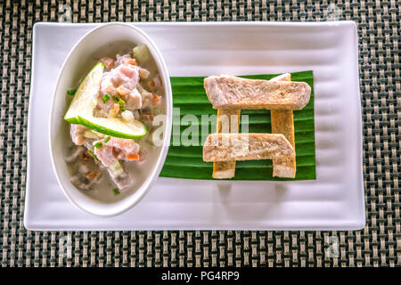 Kokoda, coconut milk ceviche, Fijian cuisine isolated on white ...