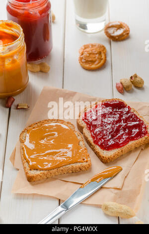 Close-up of jars of jam with white paper covers Stock Photo - Alamy