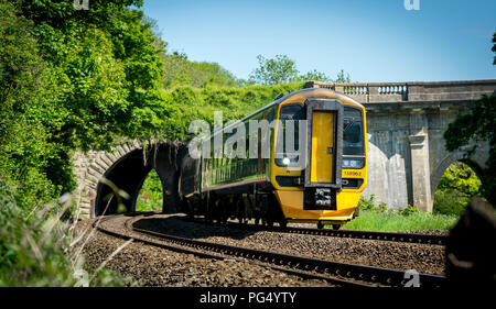 A First Great Western railway class 150 sprinter train by the station ...
