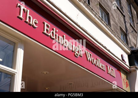 The Edinburgh Woolen Mill shop sign store front building facade York ...