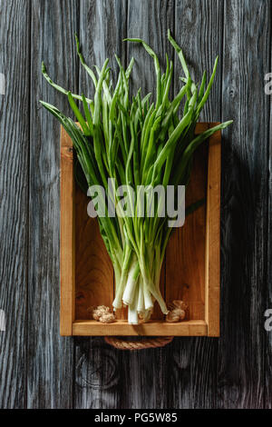 Fresh and ripe leeks in a box at the greengrocer leeks in a box at the ...