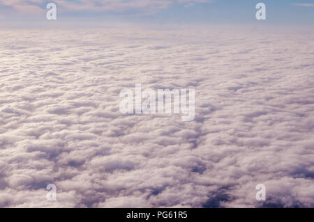 Fluffy lilac clouds Stock Photo - Alamy