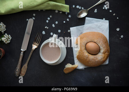 A typical food of the Spanish pastry is the Mona de Pascua. It is an ...