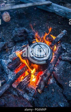 boiling over the fire Stock Photo - Alamy