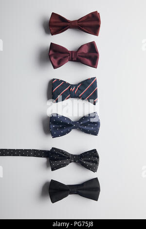 Different stylish bow ties on white background Stock Photo - Alamy