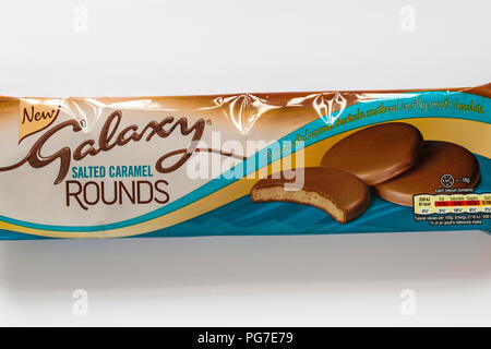Packet of new Galaxy Salted Caramel Rounds biscuits opened to show ...