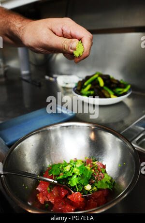 Tuna Sashimi taco with finger lime garish Stock Photo - Alamy