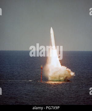 A UGM-27 Polaris submarine-launched ballistic missile is launched from ...