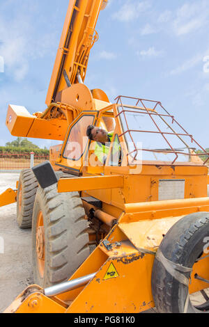 manual worker operating crane Stock Photo - Alamy