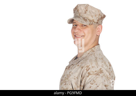 Saluting and smiling army soldier studio shoot Stock Photo - Alamy