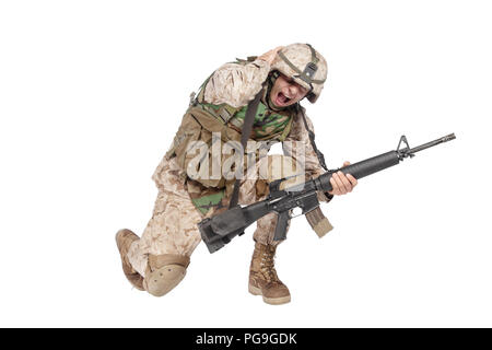 Soldier crouching after fire in the hole warning Stock Photo - Alamy
