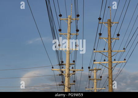 Electrical power lines hang from transmission pylons in Dhaka Stock ...