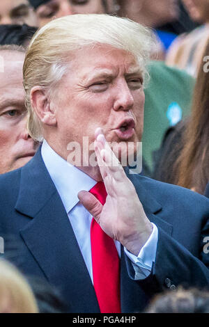 President Donald Trump gestures to the crowd as he speaks at the Mount ...