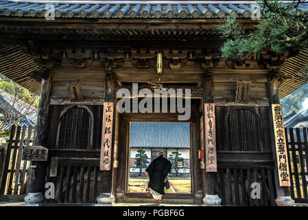Okayama, Japan: Zen Buddhist monk is praying and playing Dharma Drum in ...