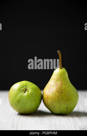 Two tasty pears, side view. Close-up Stock Photo - Alamy