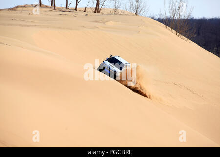 Off-road vehicle traveling in the desert, An suv was driving in the ...