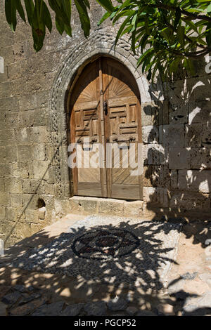Traditional ornate doorway, Lindos on the Greek island of Rhodes Stock ...