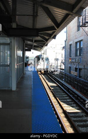 CTA Red line Howard Street public train station and rail yard on a ...