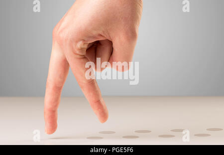 Female fingers walking with dots behind them Stock Photo - Alamy