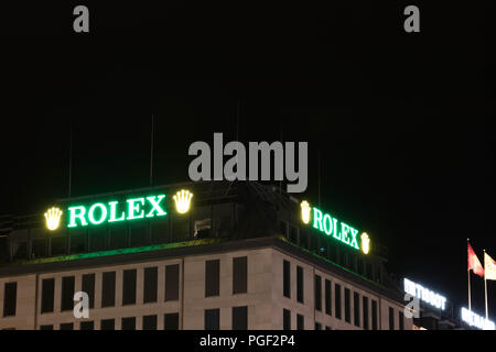 Rolex logo, neon sign Stock Photo - Alamy