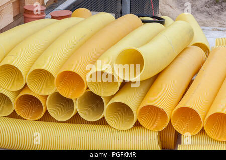 Yellow drain pipe - construction site Stock Photo - Alamy