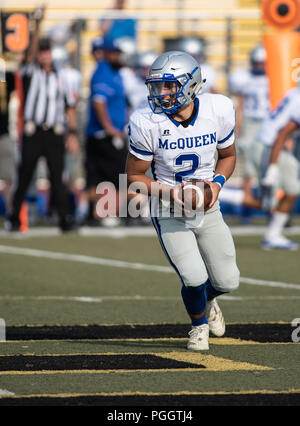 Football action with McQueen High School junior varsity at Enterprise ...
