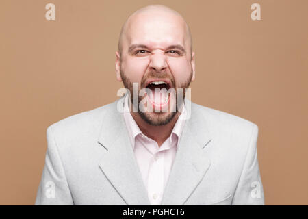 bald man screaming with shocked hand gesture Stock Photo - Alamy