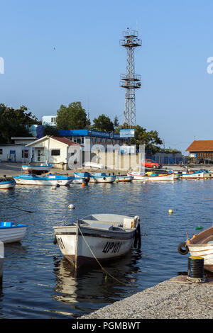 TSAREVO, BULGARIA - JUNE 29, 2013: Old boat at the port town of Tsarevo ...