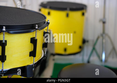 yellow drum. musical purcussion instrument Stock Photo - Alamy