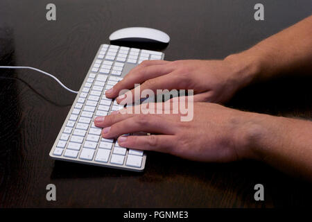 Typing Hands using Arrow Keys on Desk with Mouse and Keyboard Stock ...