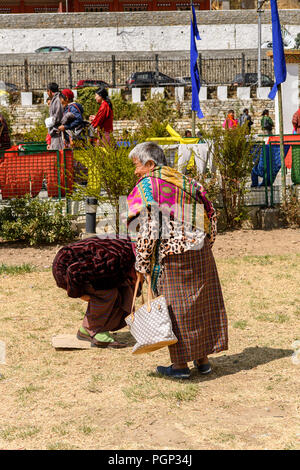 TRIMPHU, BHUTAN - MAR 8, 2017: Unidentified Ngalops people watch the ...