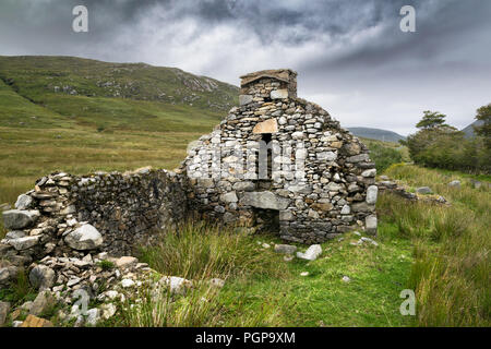 Abandoned stone cottage at the Famine village of Port in Glencomcille ...