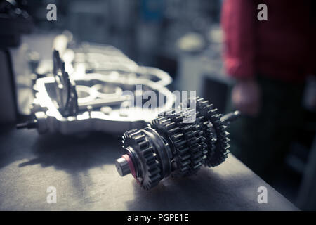 Gears from a motorcycle gearbox Stock Photo - Alamy
