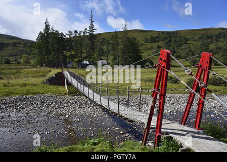 The River Rhiddorroch footbridge leading to East Rhiddorroch Lodge at ...