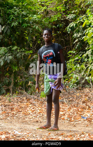 SOGA, GUINEA BISSAU - MAY 5, 2017: Unidentified local people rest on ...