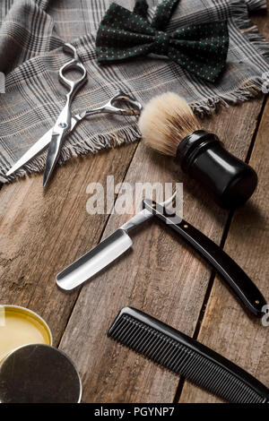 Scissors, comb and bow tie Stock Photo - Alamy