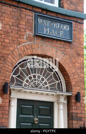 Manchester University Waterloo Place buildings. Row of terraced houses ...