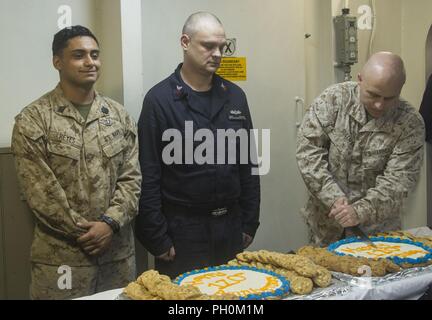 U.S. Marine Corps Col. Farrell J. Sullivan, left, commanding officer of ...