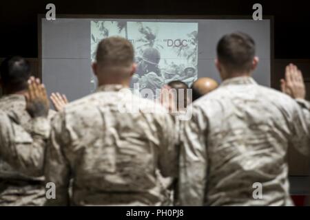 U.S. Navy Corpsmen recite the Corpsman Pledge during the 124th Corpsmen ...