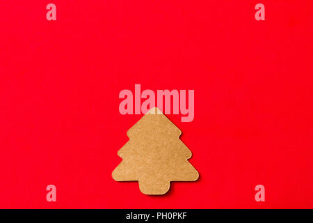 Christmas tree label on red background Stock Photo - Alamy