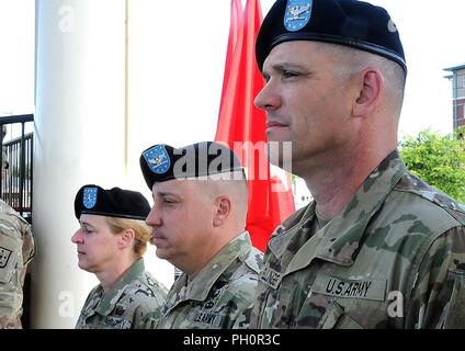 Brig. Gen. Heidi J. Hoyle accepts the plaque designating her as the ...