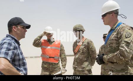 As part of Army Prepositioned Stock-3, military vehicles and containers ...