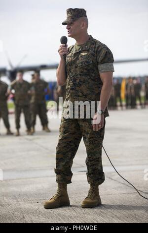 U.S. Marine Brig. Gen. Karsten S. Heckl watches a product demonstration ...