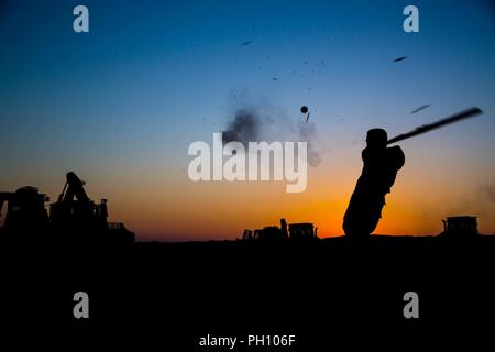 U.S. Army Pfc. Michael Gilreath, 3rd Cavalry Regiment, swings an ...