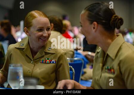 U.S. Air Force Maj. Amanda Altman, right, 422d Communications Squadron ...