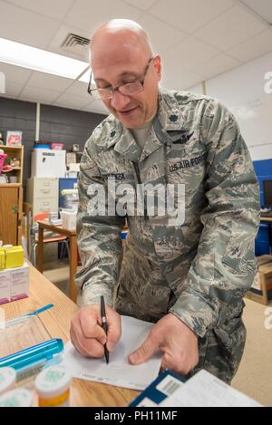 US Navy Navy Lt. a pharmacist with the Medical Treatment Facility ...