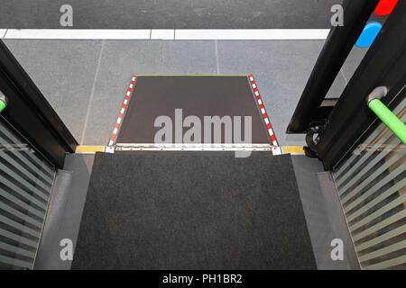 Retractable Ramp for Wheelchair at City Bus Stock Photo - Alamy