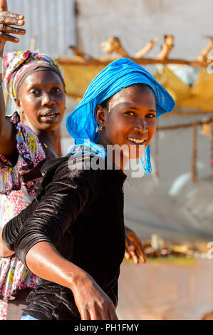ROAD TO LAMPOUL, SENEGAL - APR 23, 2017: Unidentified Senegalese man ...