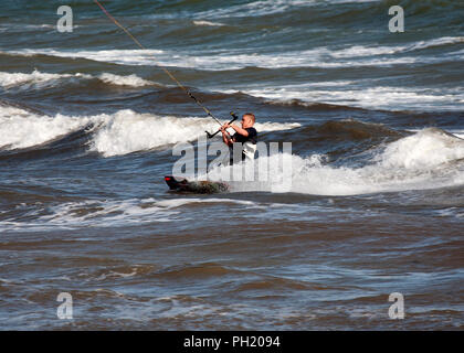 Wind surfer near Long Quarry Point Torquay UK Stock Photo - Alamy