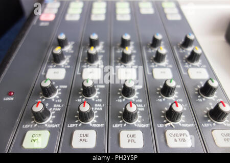 Radio station mixing desk controls and dials Stock Photo - Alamy